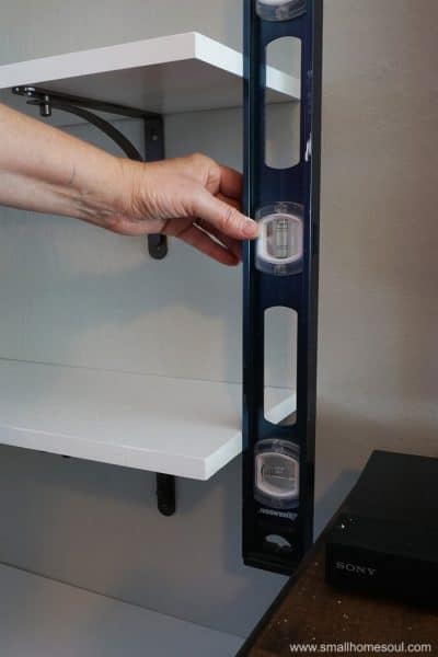 How to Install Shelves - That are Perfectly Level - Girl, Just DIY!