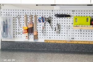 How to Install Pegboard above your Workbench - Girl, Just DIY!